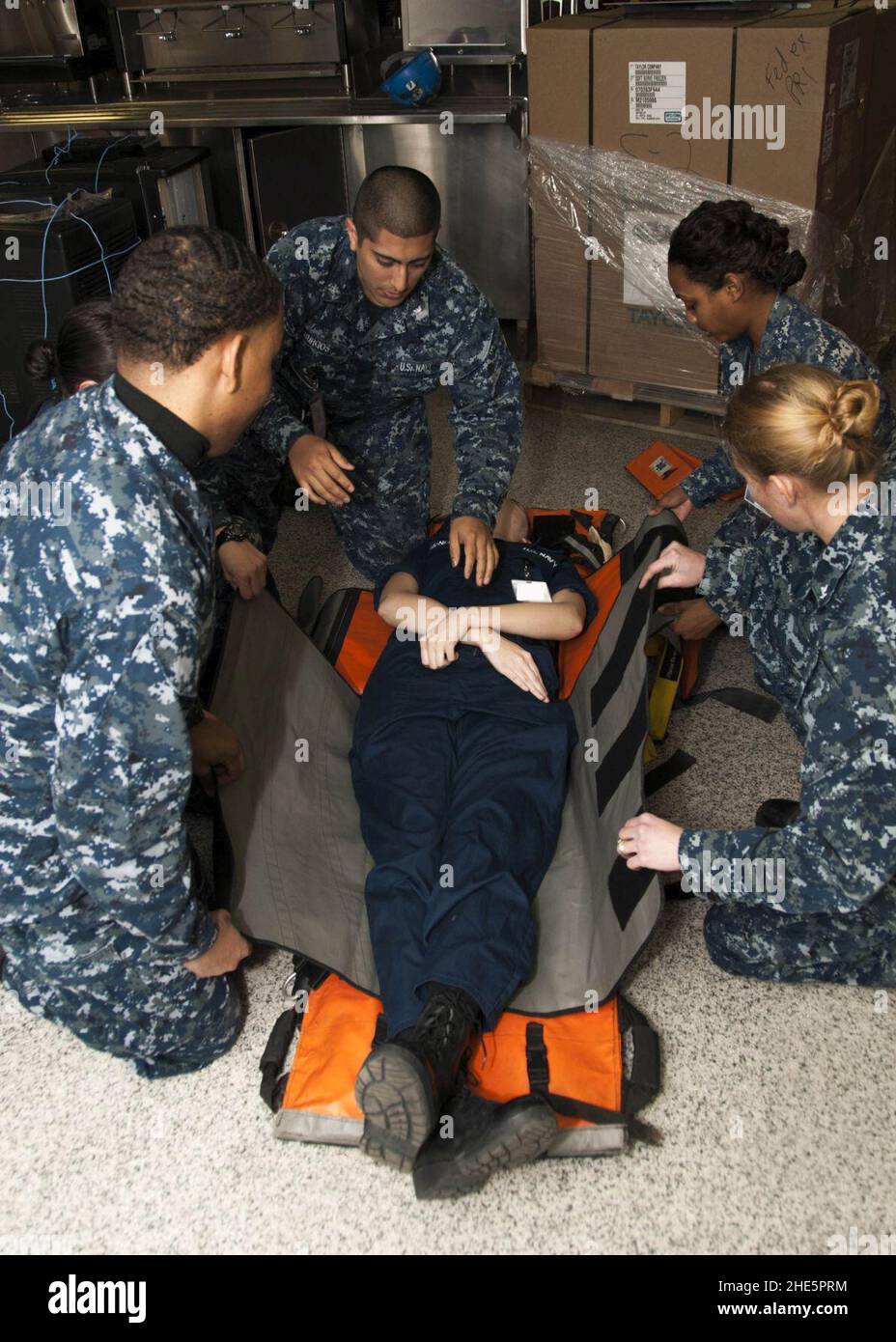 Sailors practice using a stretcher. (8270224120 Stock Photo - Alamy