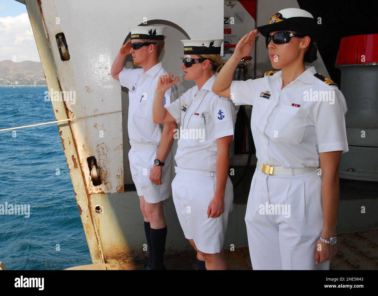 Sailors render honors as distinguished visitors depart HMAS Tobruk ...
