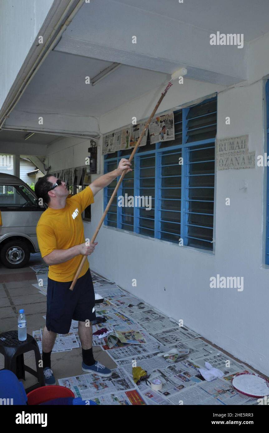 Sailors work in Malaysia Stock Photo - Alamy
