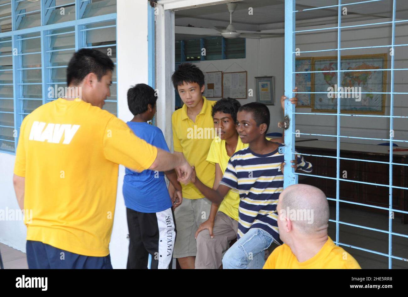 Sailors work in Malaysia Stock Photo - Alamy