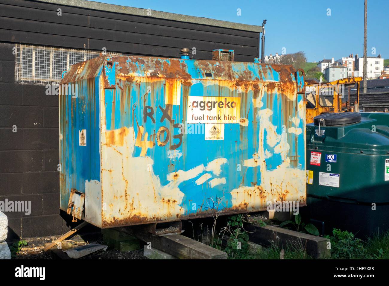 Old rusty oil tank on Hastings Stade beach Stock Photo - Alamy
