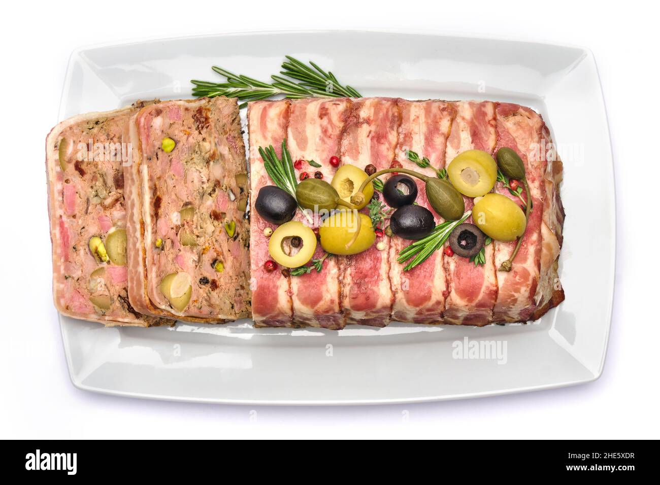 Traditional French terrine covered with bacon isolated on white ...