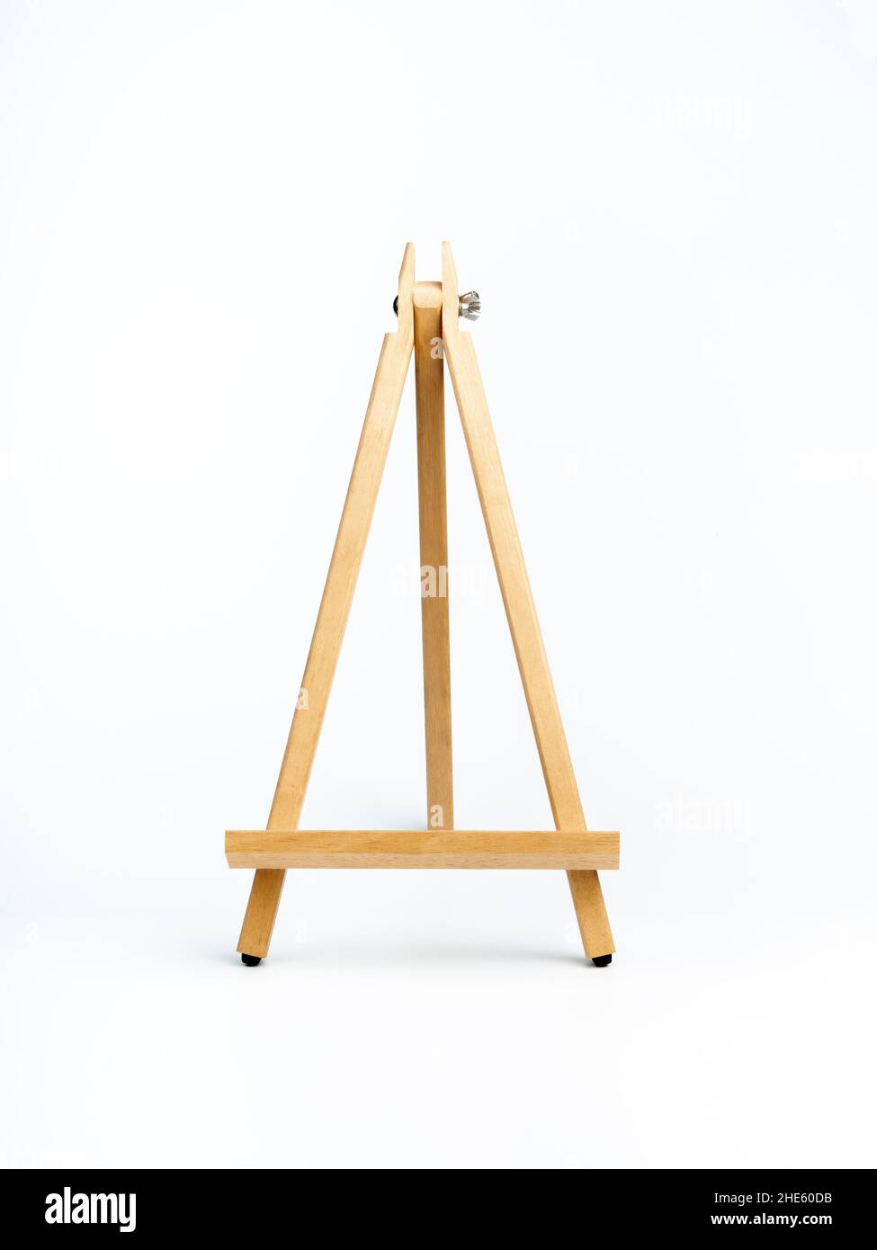 Wooden easel isolated on white background, vertical style. Advertising ...