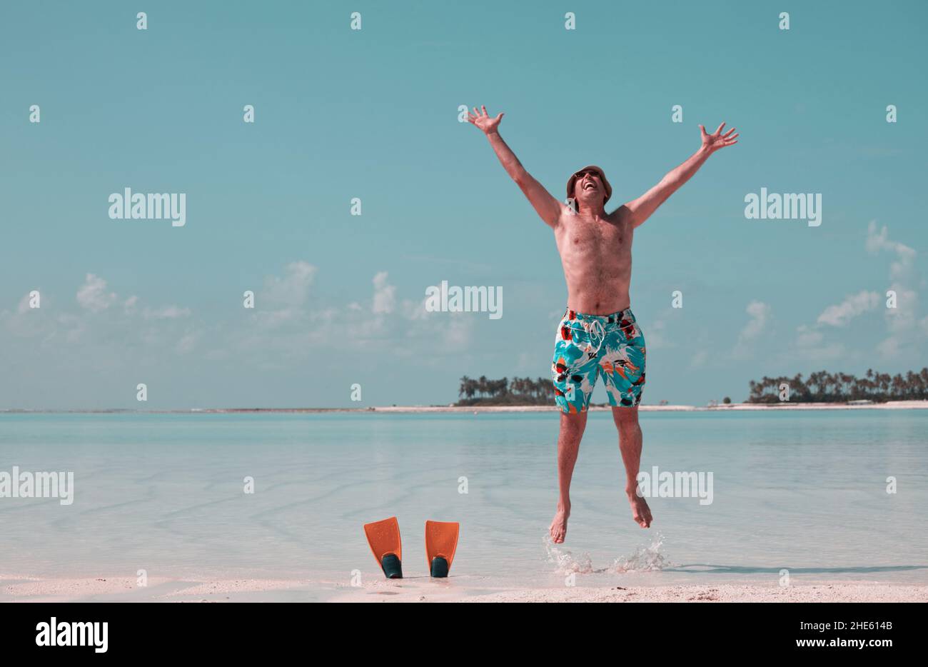 Happy Man in the tropical beach. Travel and emotion concept Stock Photo ...