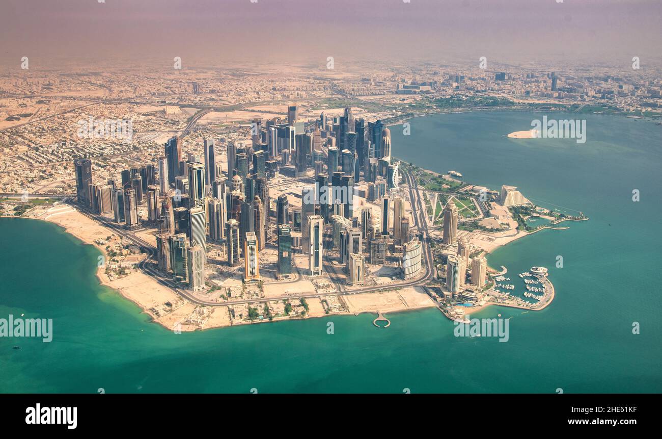 Doha West Bay and Corniche aerial view from aircraft on a sunny day ...