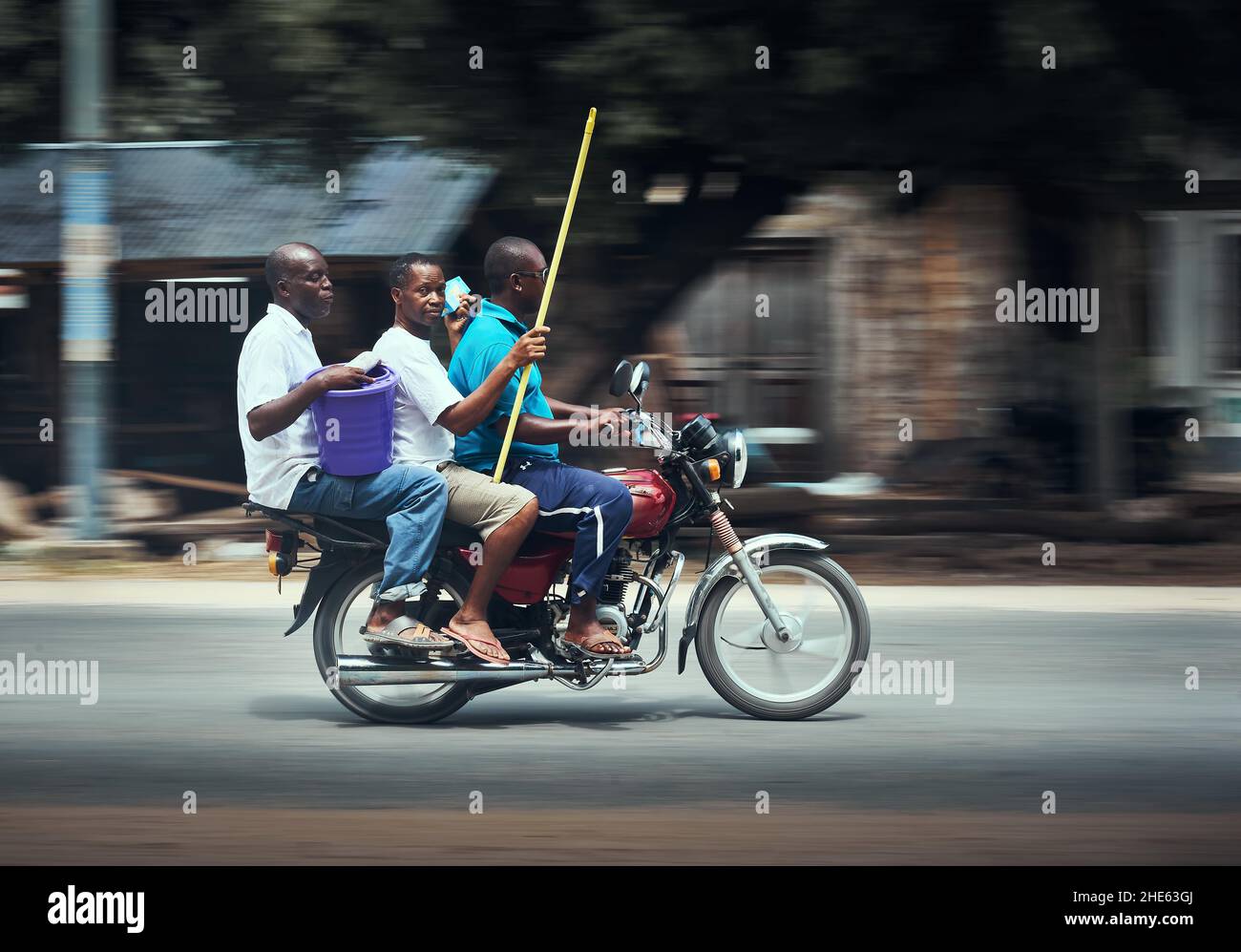 Three people riding a motorcycle hi-res stock photography and images ...