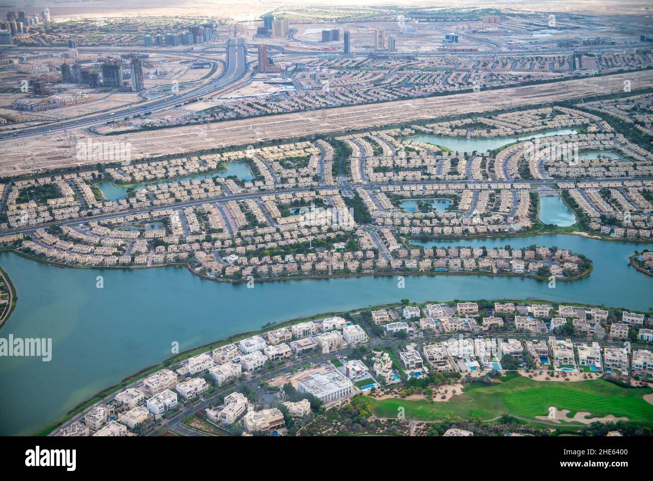 Aerial view of Dubai small homes along the water Stock Photo - Alamy