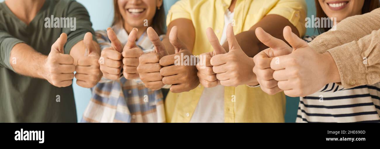 Banner with diverse group of happy people showing positive thumbs up ...