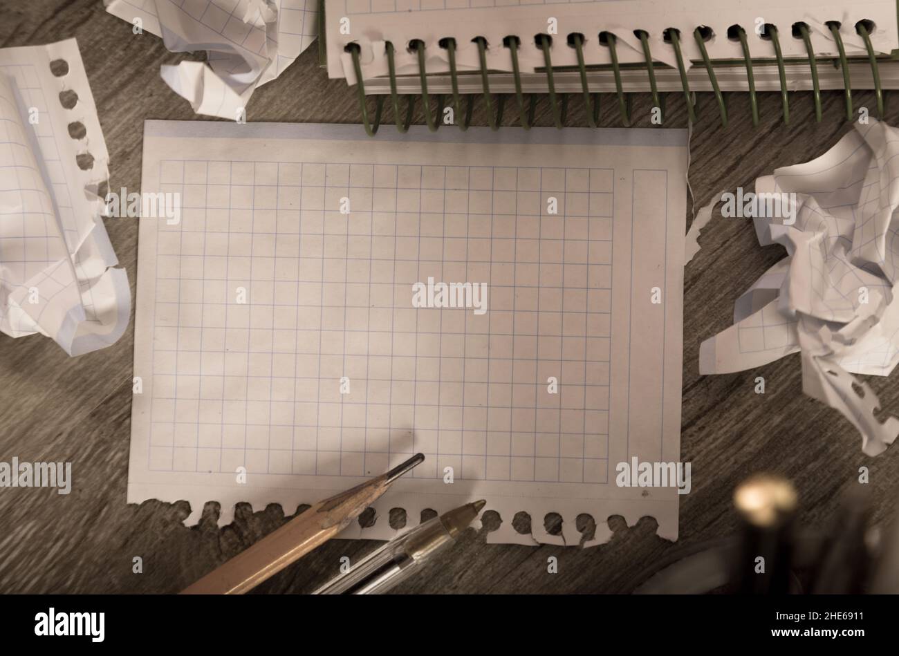 Crumpled pages and notebook Stock Photo - Alamy