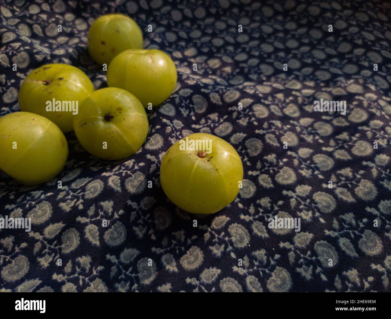 indian gooseberry or amla kept in sunlight for drying. fresh raw ...