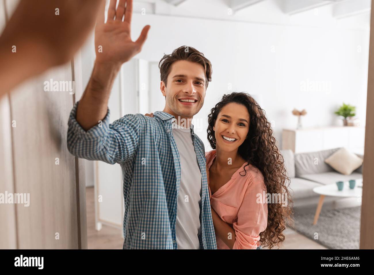 Man woman female couple entering front entrance hi-res stock ...