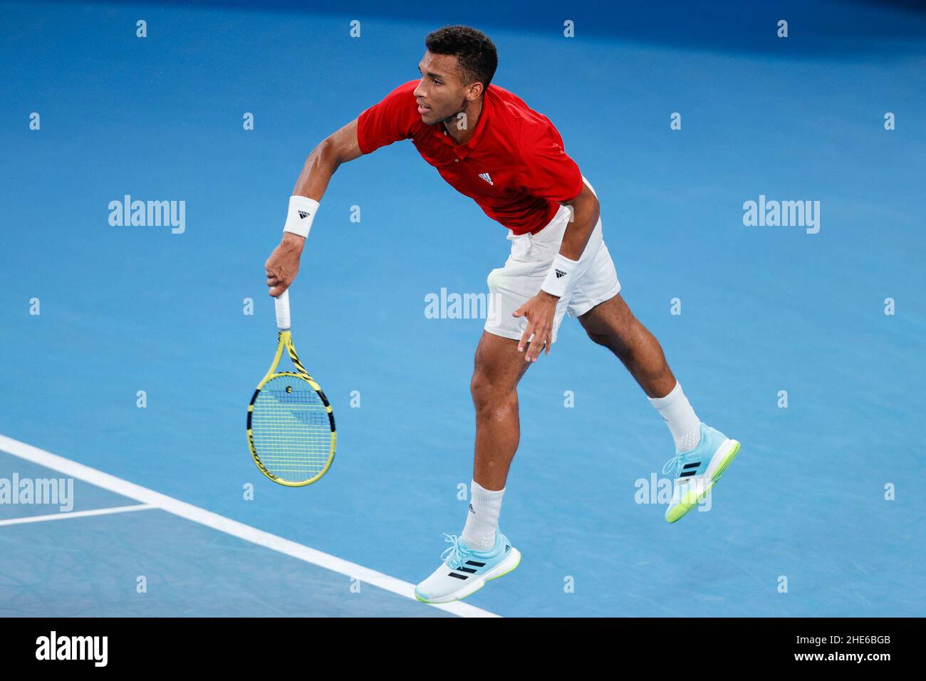 Sydney, Australia. 09th Jan, 2022. Felix Auger-Aliassime of Team Canada serves to Roberto ...