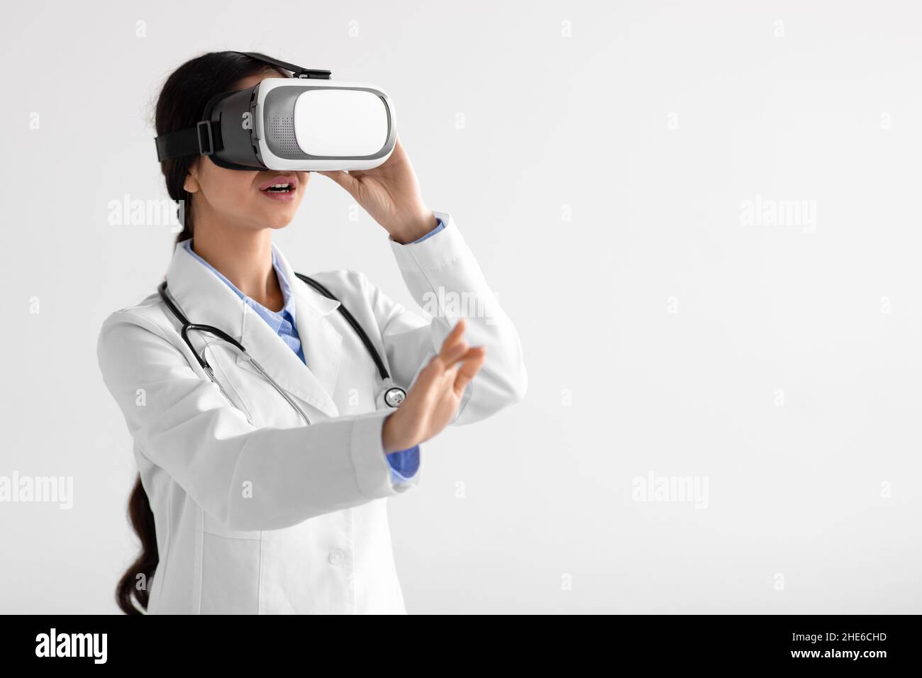 Shocked Millennial Cute Hindu Female Medical Worker In Uniform And