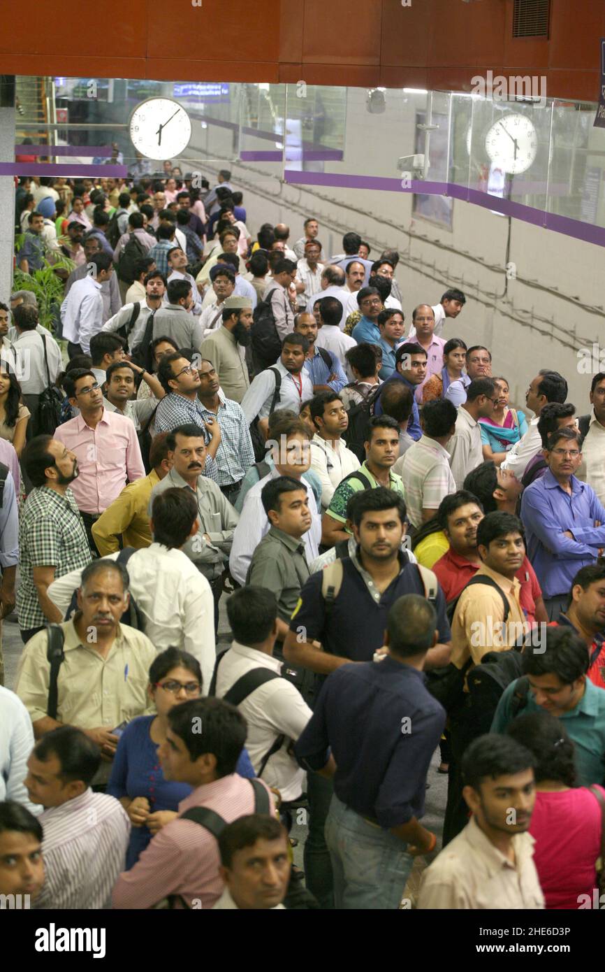 Passengers wait for their turn to board in a metro train at metro ...