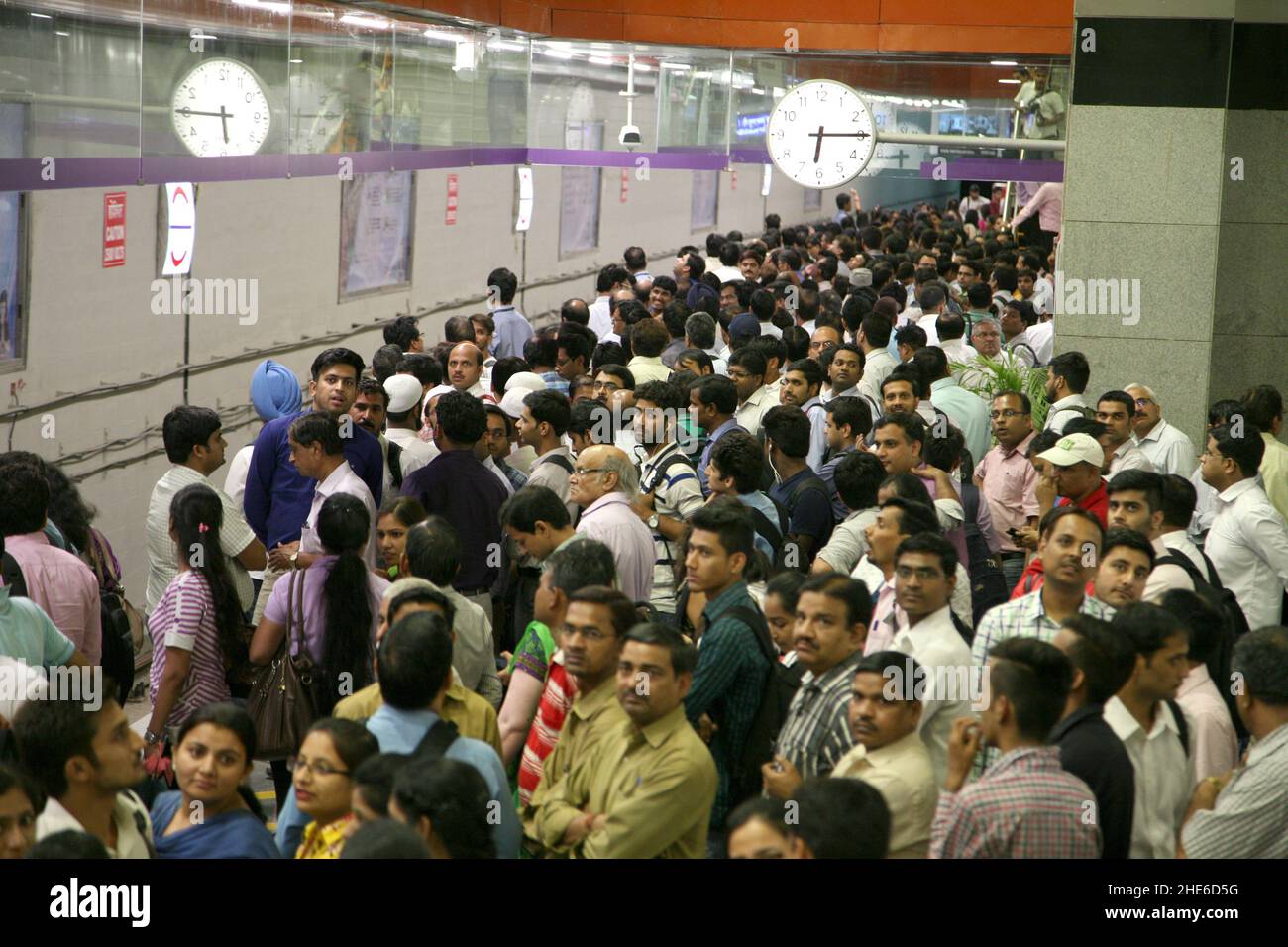 Passengers wait for their turn to board in a metro train at metro ...