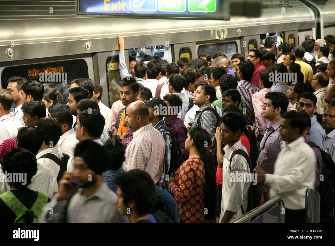 Passengers wait for their turn to board in a metro train at metro ...