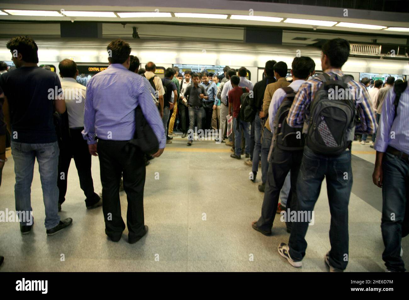 Passengers wait for their turn to board in a metro train at metro ...