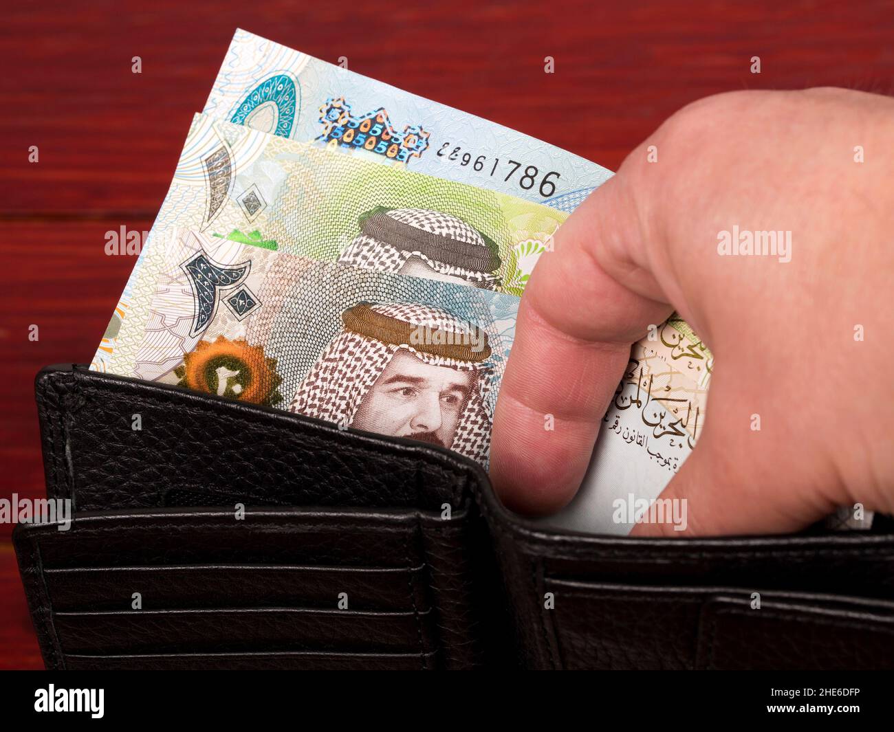 Bahraini money - dinar in the black wallet Stock Photo - Alamy