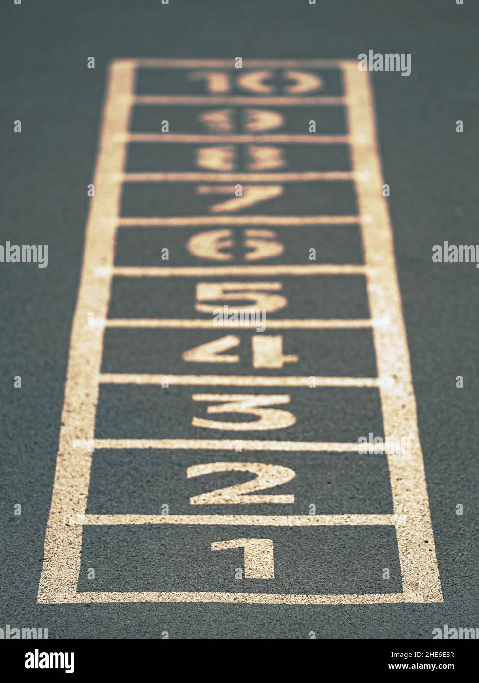 Hopscotch game numbers. Classics game painted on the tarmac of the ...