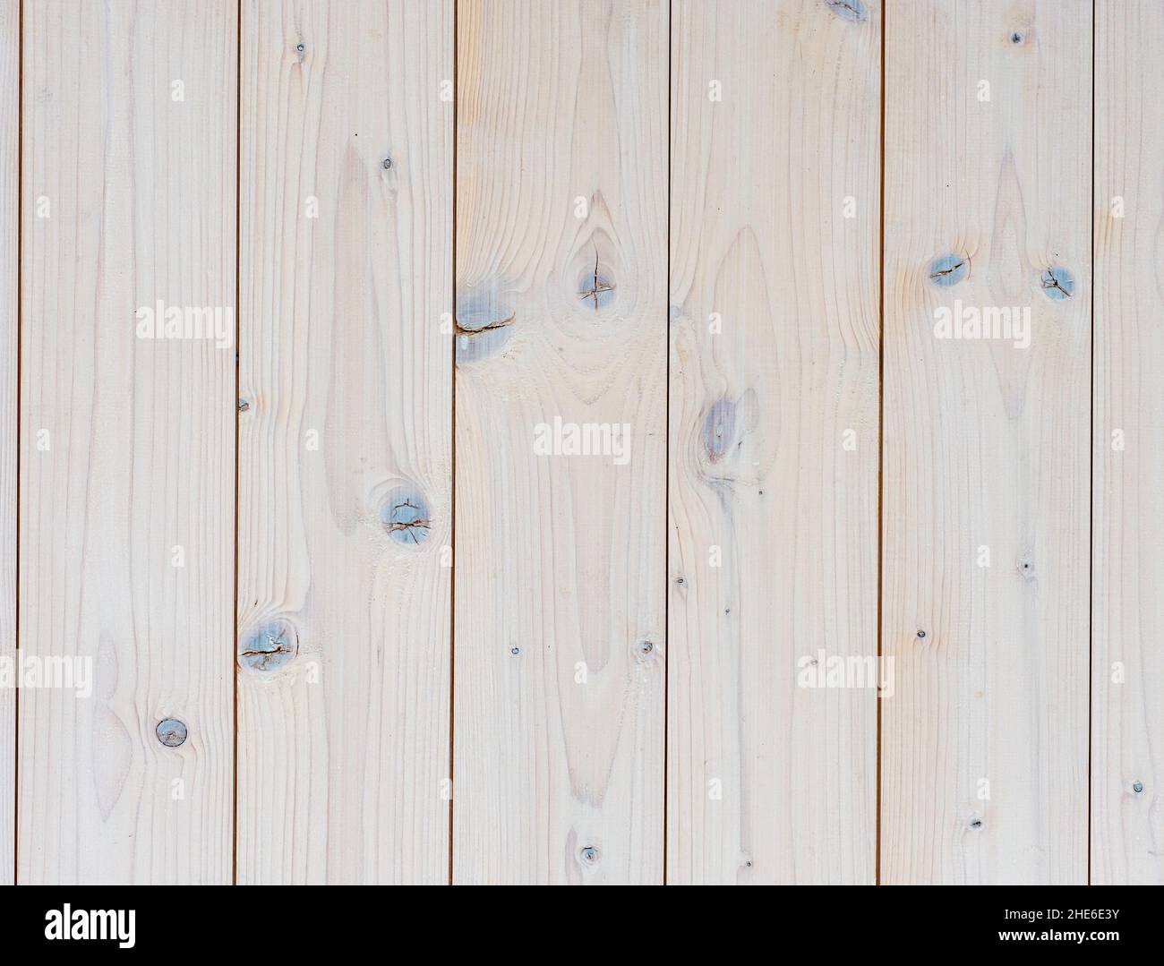 Light grey wood with screws on the vertical planks. Natural wood ...