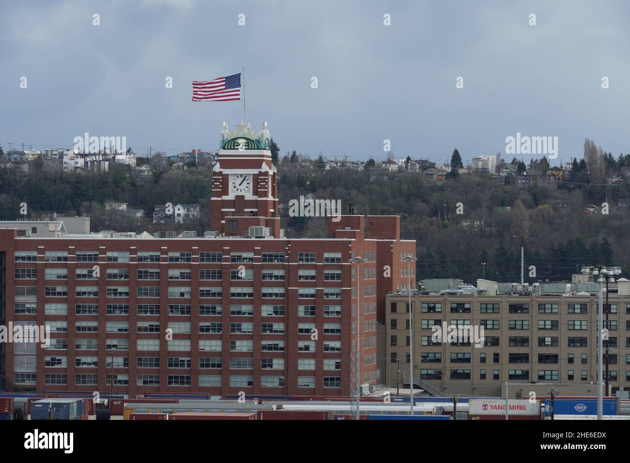Headquarter of Starbucks with American flag on top and other buildings ...