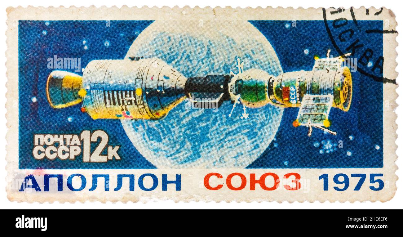 Stamp printed in USSR (Russia) shows docking of spacecraft Soyuz and ...