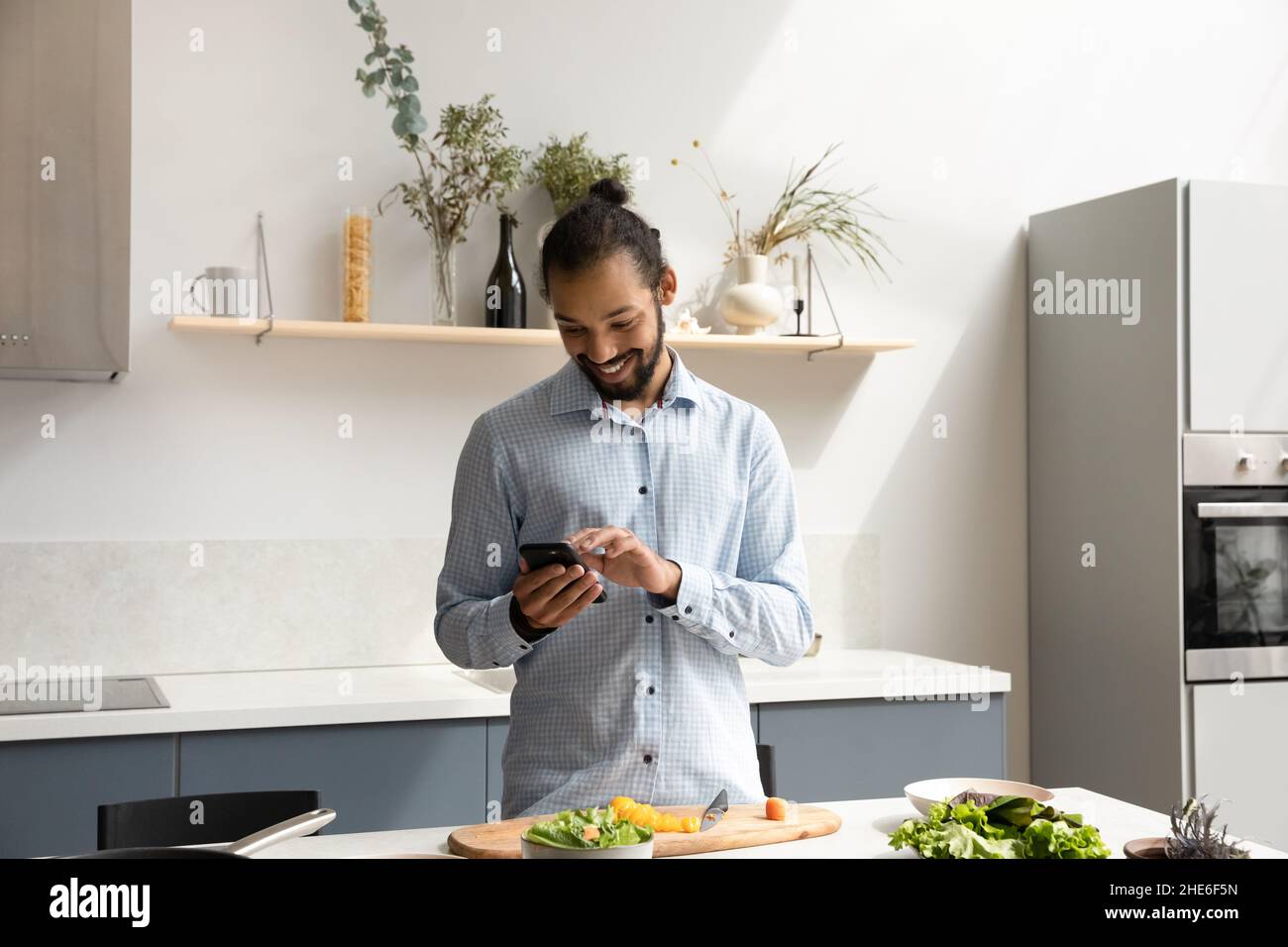 Black man eating lunch in hi-res stock photography and images - Alamy