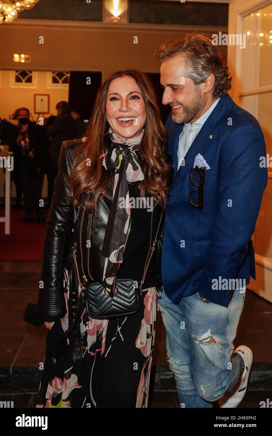 05 January 2022, Berlin: Simone Thomalla and Philipp Sattler arrive at ...