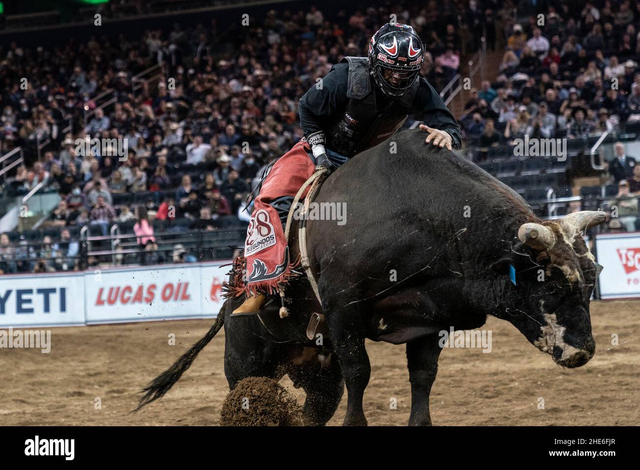 Joao Henrique Lucas of Bastos, Brazil rides a bull during 2nd day of ...
