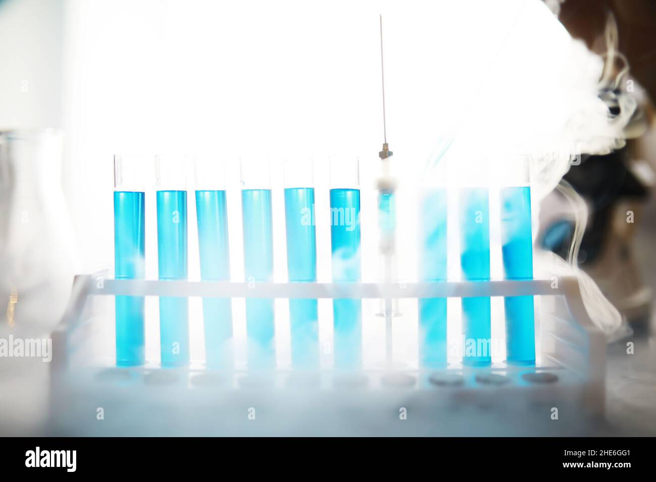 Test tube of glass overflows new liquid solution potassium blue ...