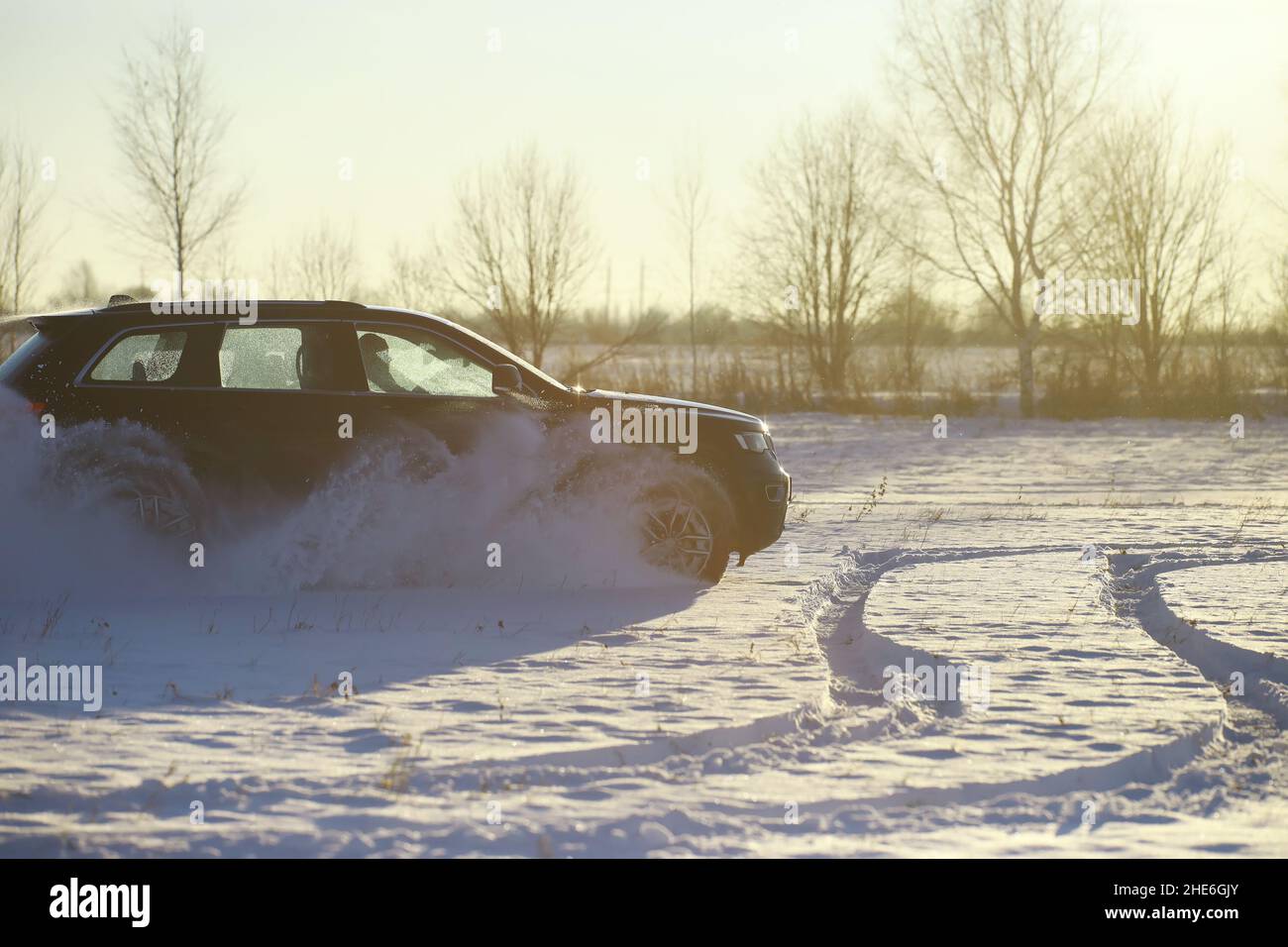 Car in the field winter. Off-road winter snow drifts. Extreme sport ...