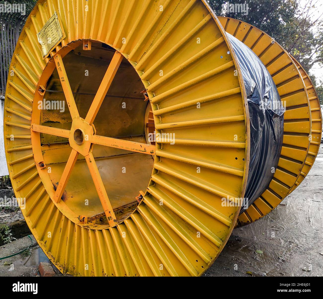 A close up shot of heavy overhead cable roll for electrical power ...