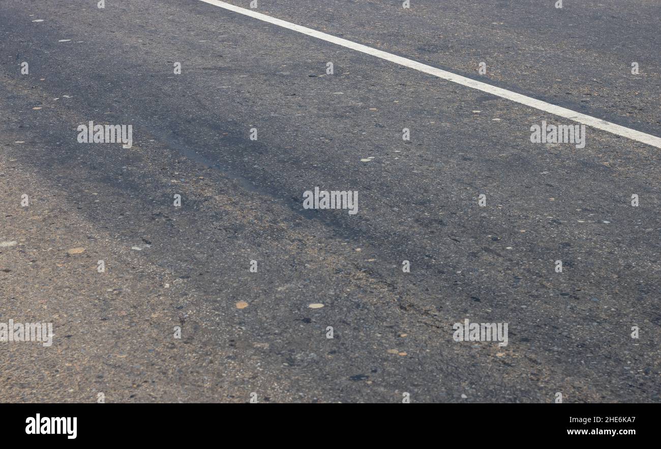 Asphalt road close up perspective view with selective focus Stock Photo ...