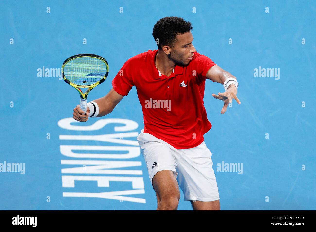 Sydney, Australia. 09th Jan, 2022. Felix Auger-Aliassime of Team Canada plays a shot against ...