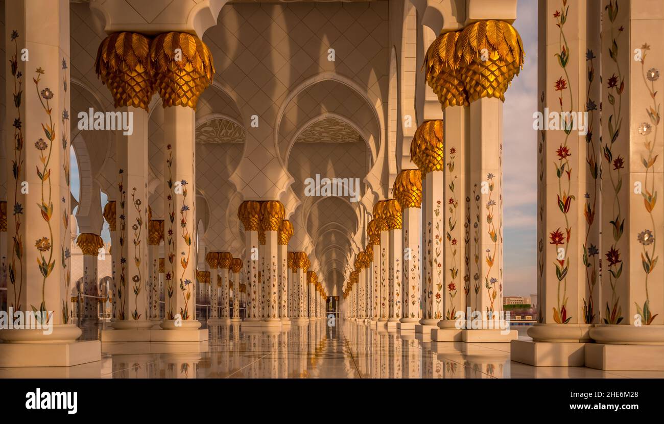Looking along the white, floral decorated, marble columns at the Sheikh ...