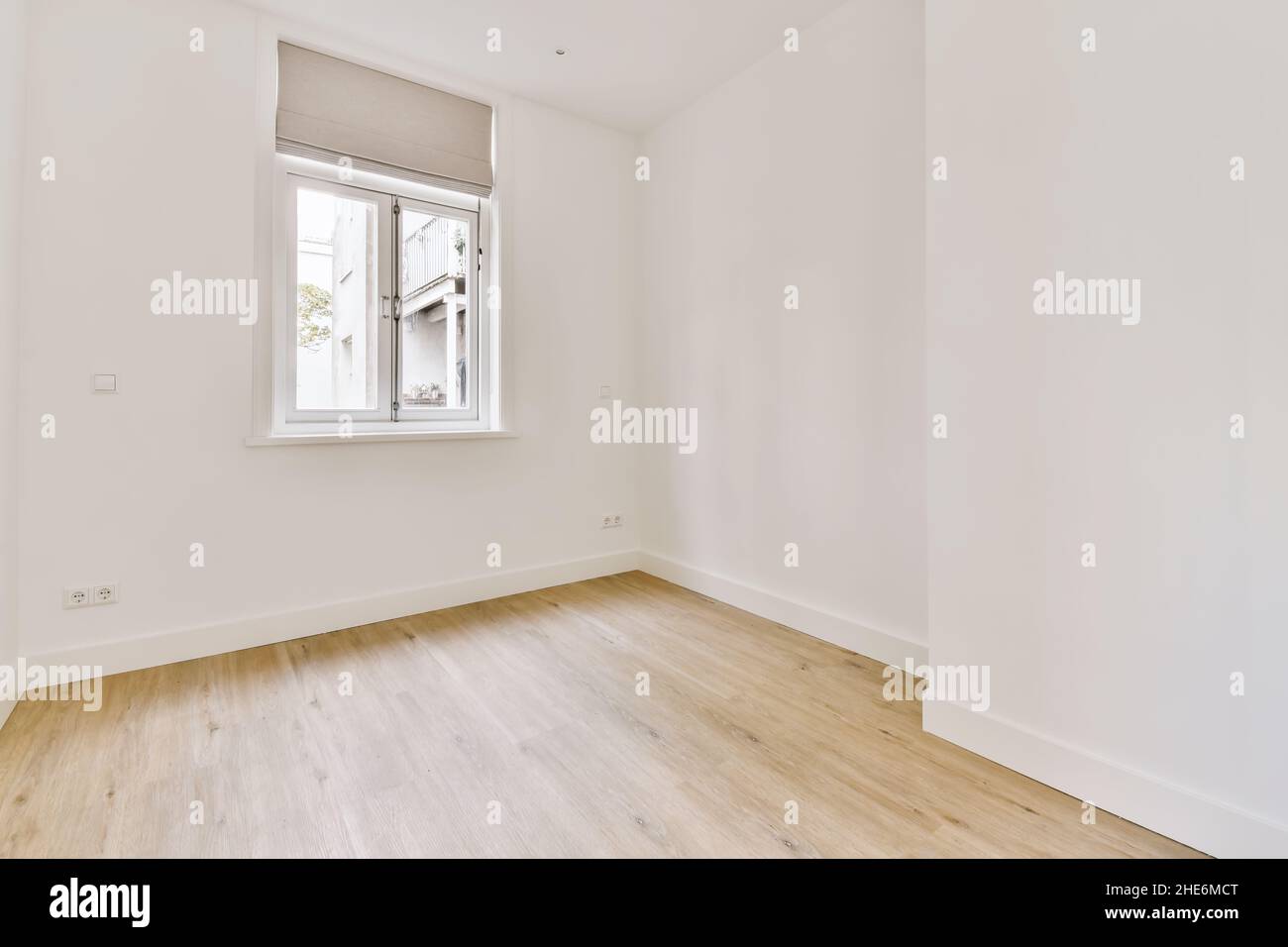Interior of a bright room with large windows Stock Photo - Alamy