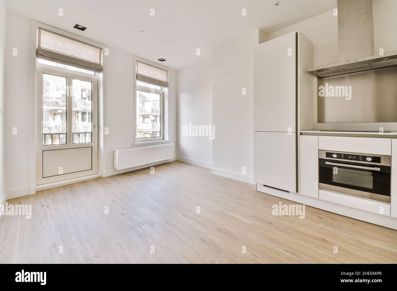 Interior of a bright room with large windows Stock Photo - Alamy