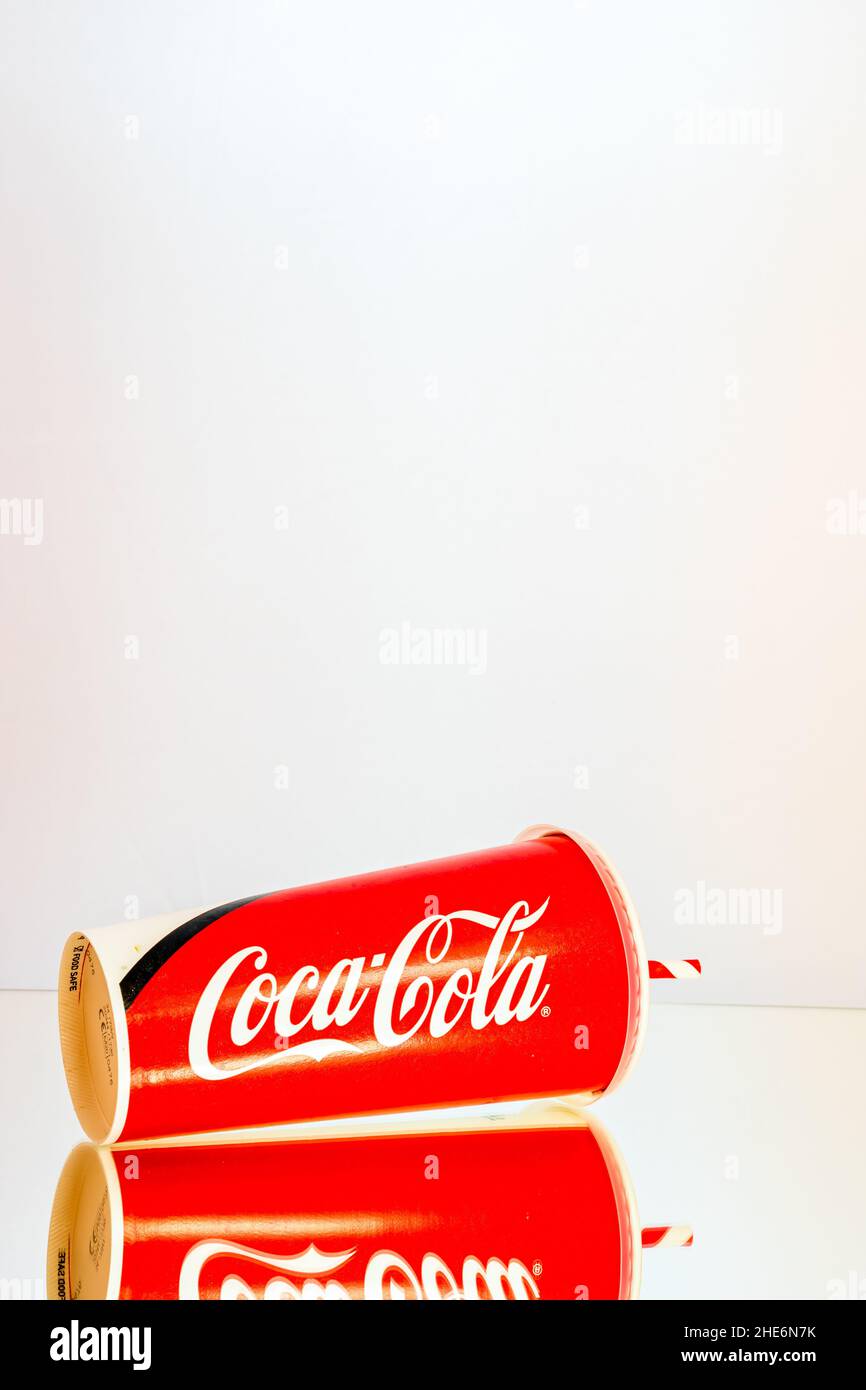 Coca Cola paper cup. Illustrative editorial photo in studio in ...
