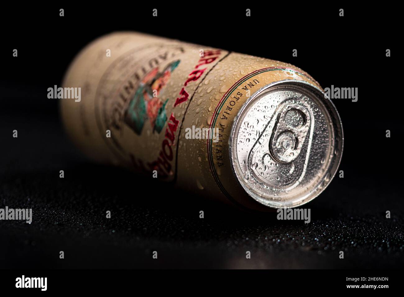 Birra Moretti, a premium lager beer with water droplets on black ...