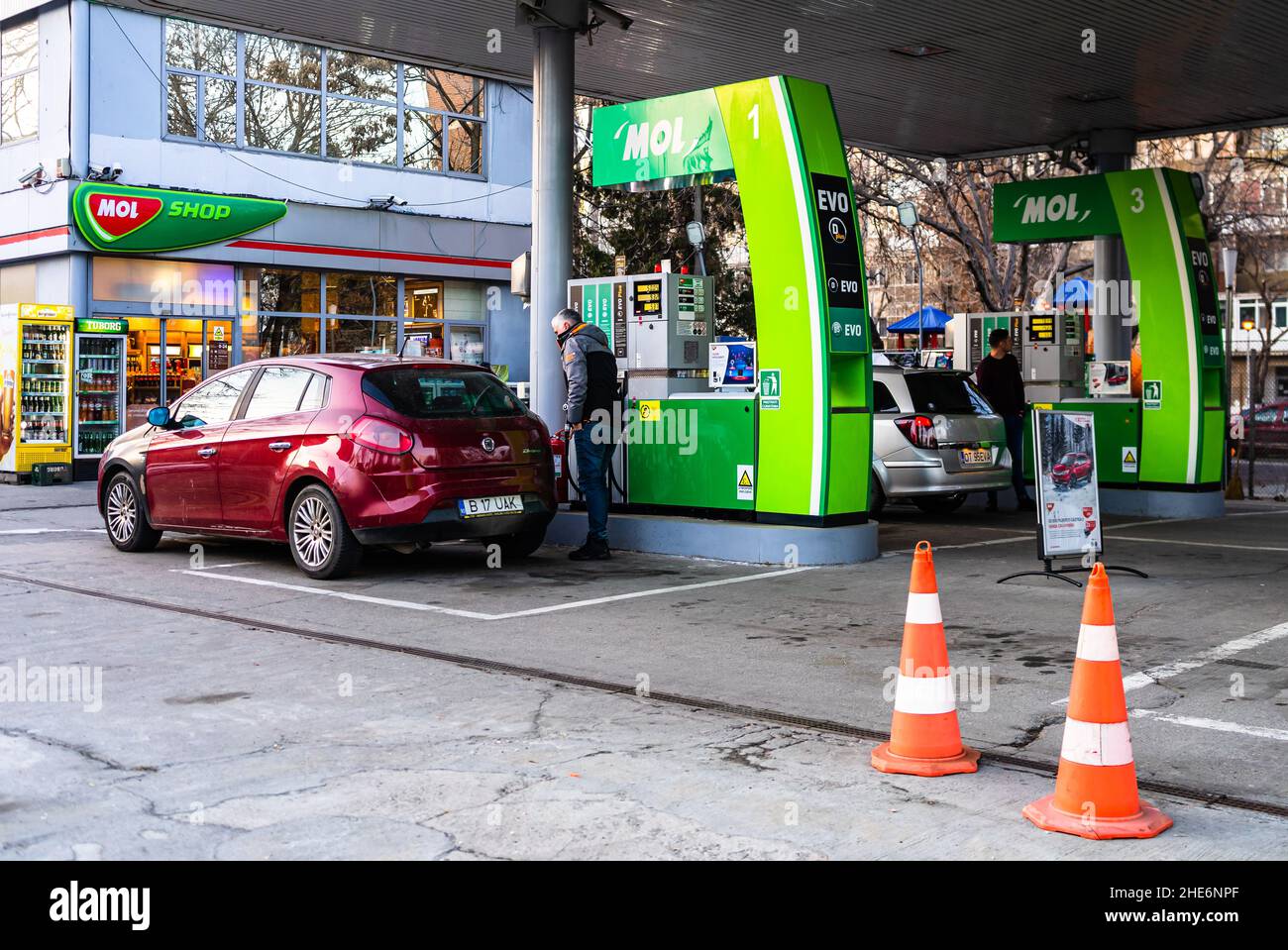 People filling their car tanks at MOL petrol gasoline station in ...