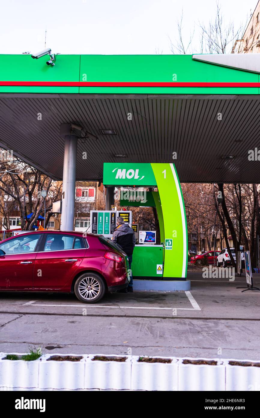 People filling their car tanks at MOL petrol gasoline station in ...