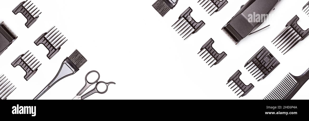 Professional hair clipper with set of nozzles of different sizes ...