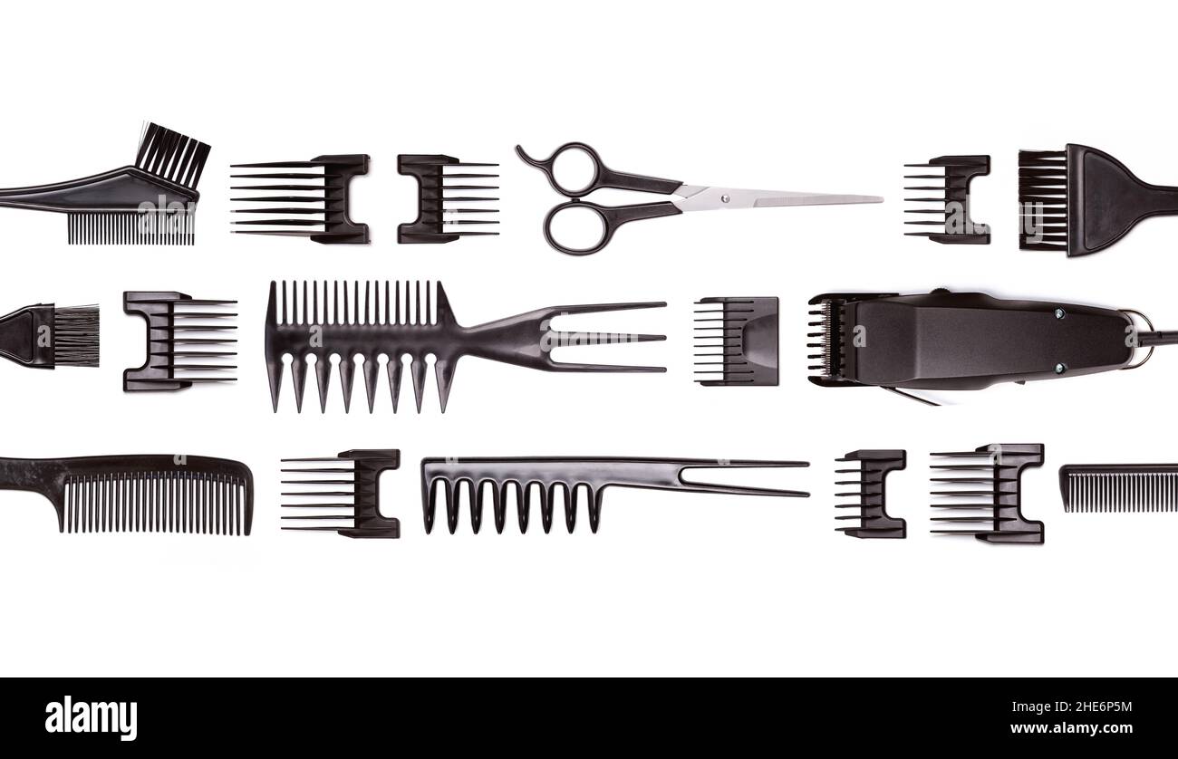 Professional hair clipper with set of nozzles of different sizes ...