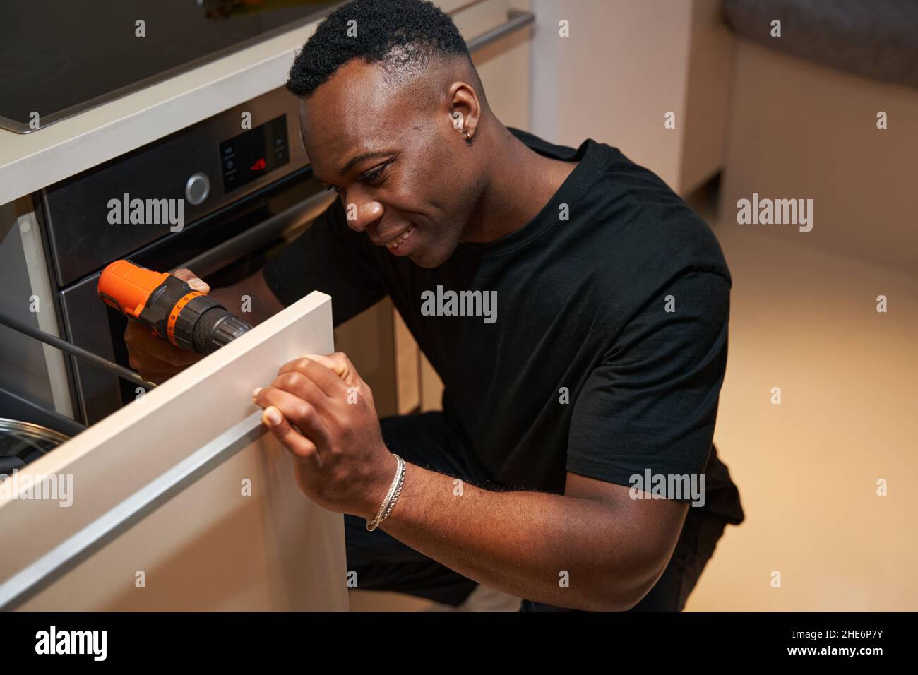 Attaching the handle hi-res stock photography and images - Alamy