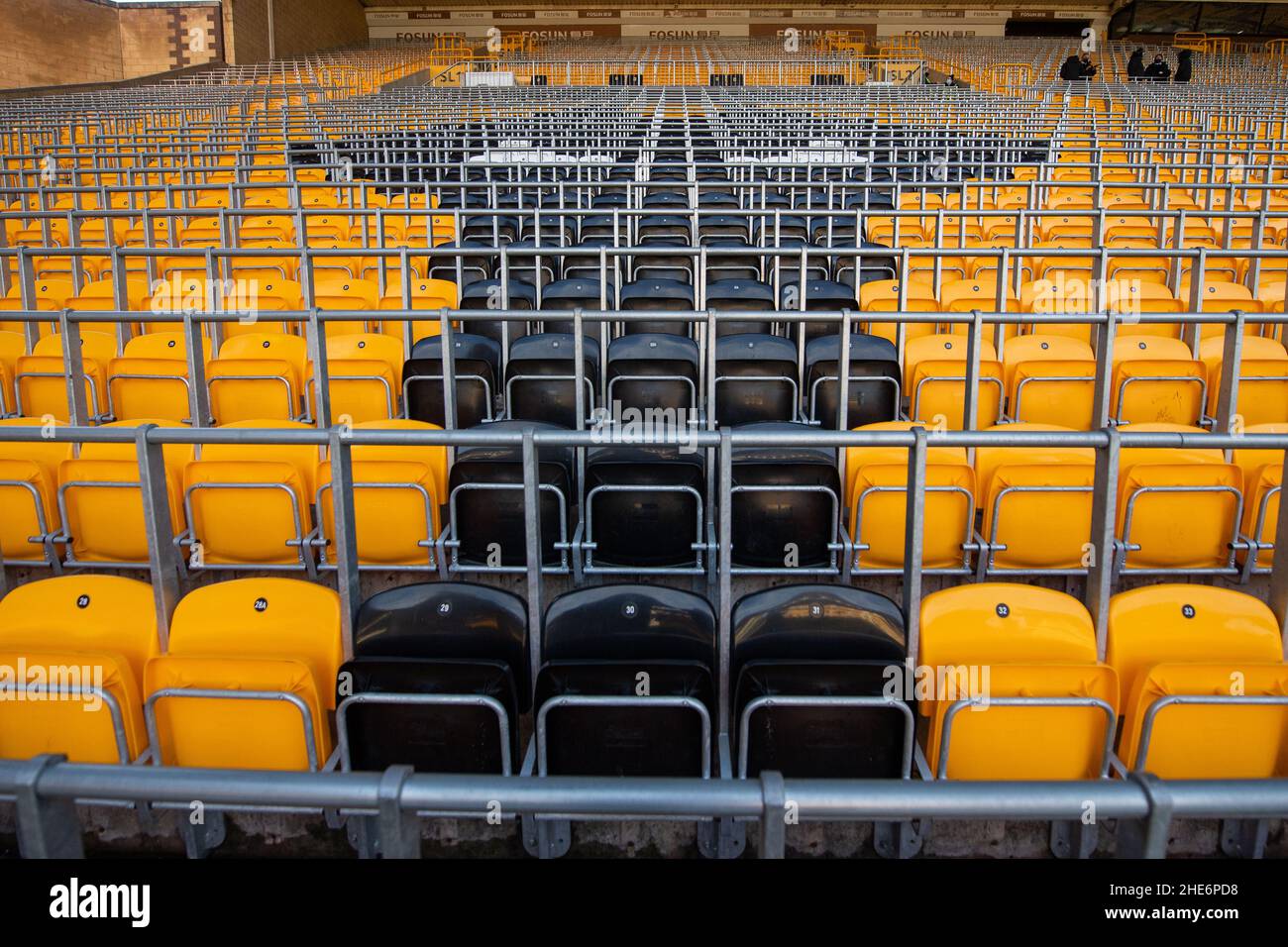 View of the standing area with wolves branded seats at Molineux, Home ...