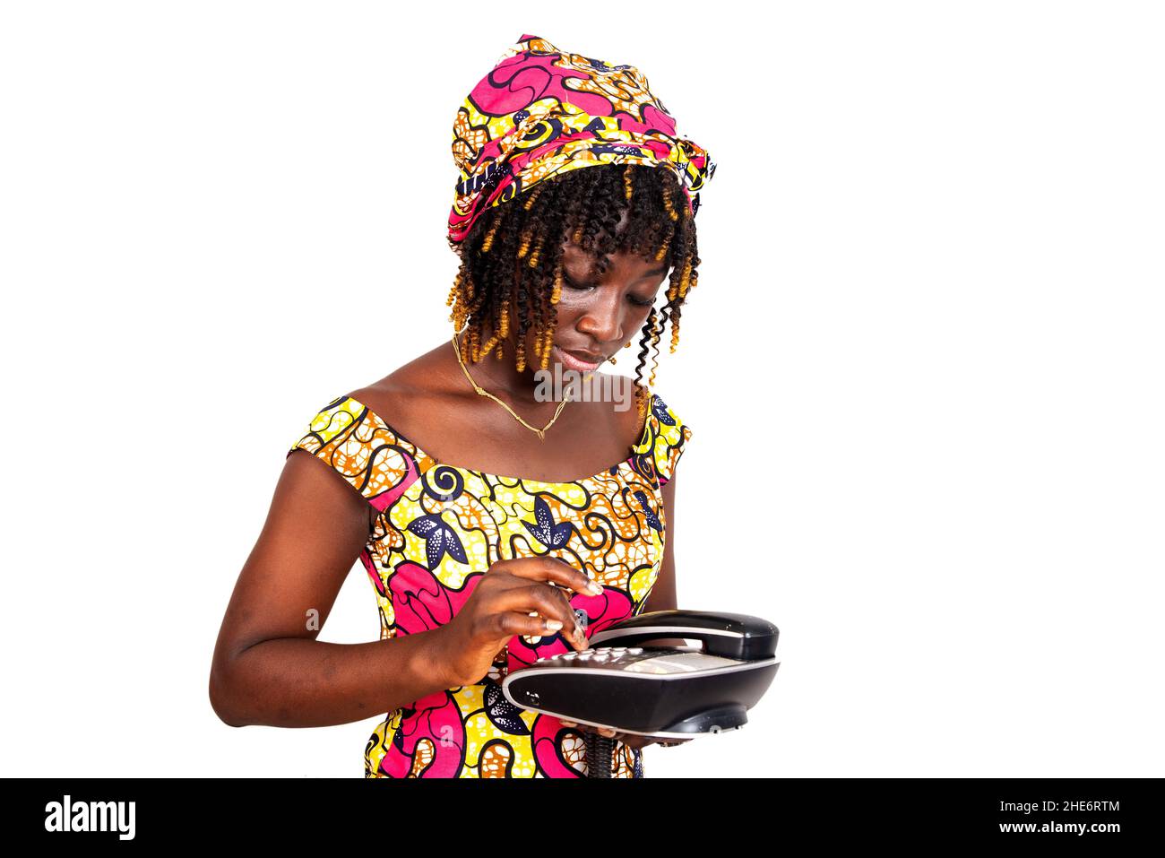Beautiful young serious woman dialing number on mobile phone Stock ...
