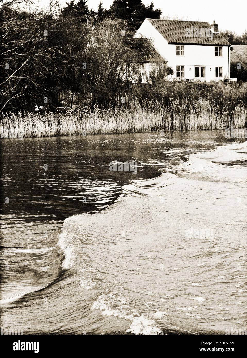 old cottage on banks of river waveney at beccles suffolk england Stock ...