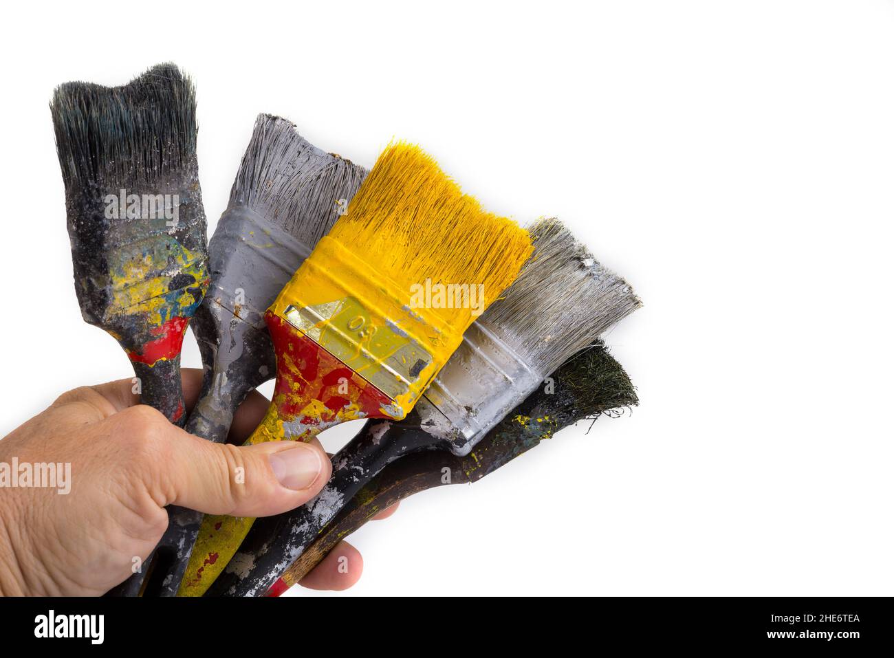 Bunch of old used brushes on a white background Stock Photo - Alamy