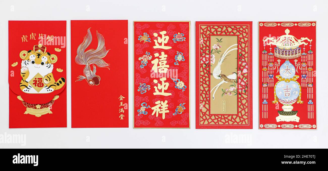 A selection of 5 different Chinese New Year lucky red envelopes with ...