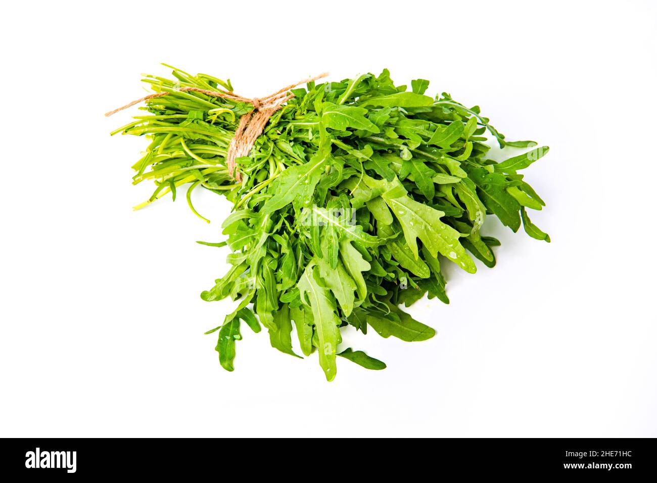 Fresh organic green ruccola on white background isolated Stock Photo ...
